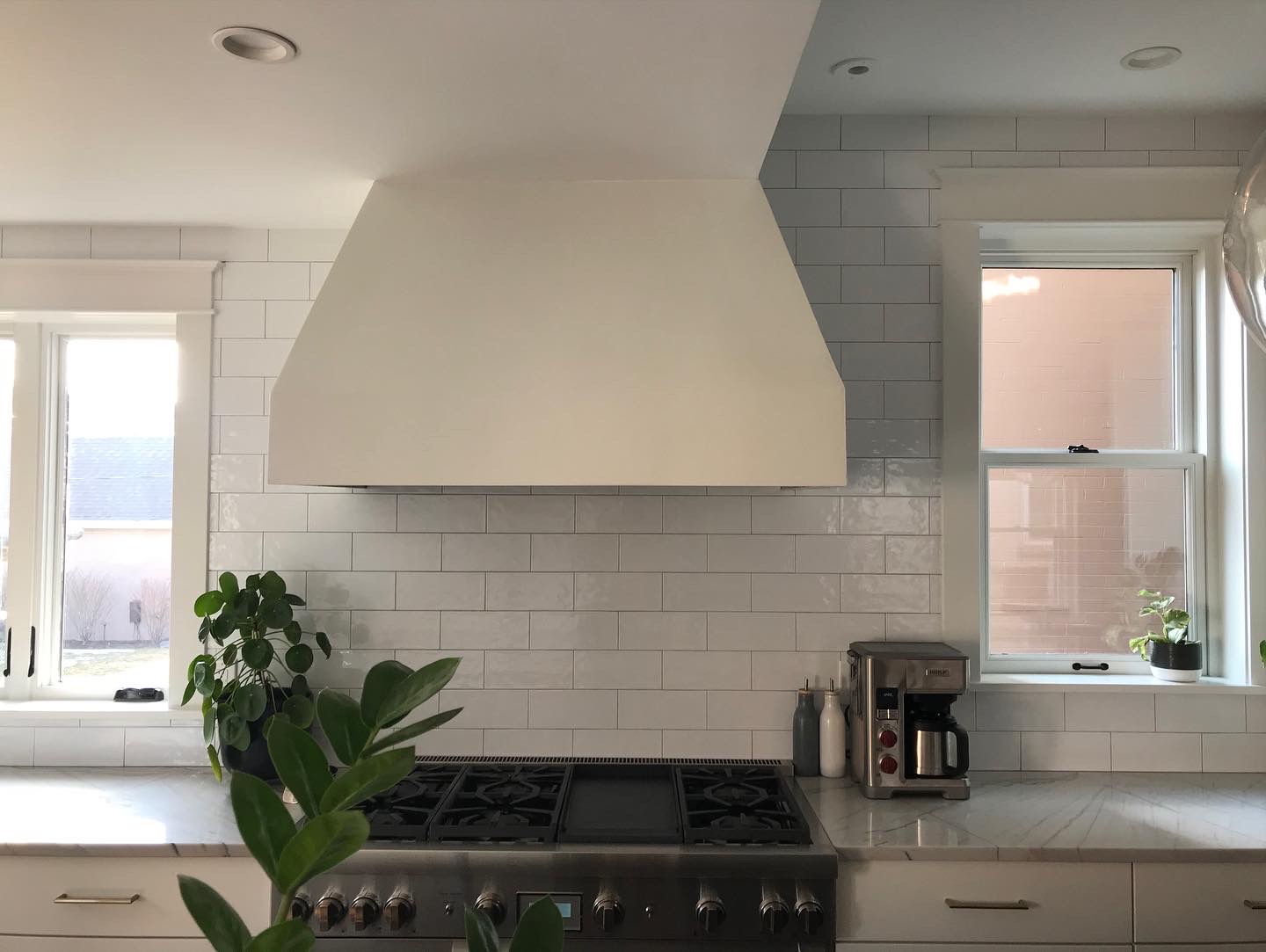 Kitchen backsplash- subway tile in offset pattern up to the ceiling by ...