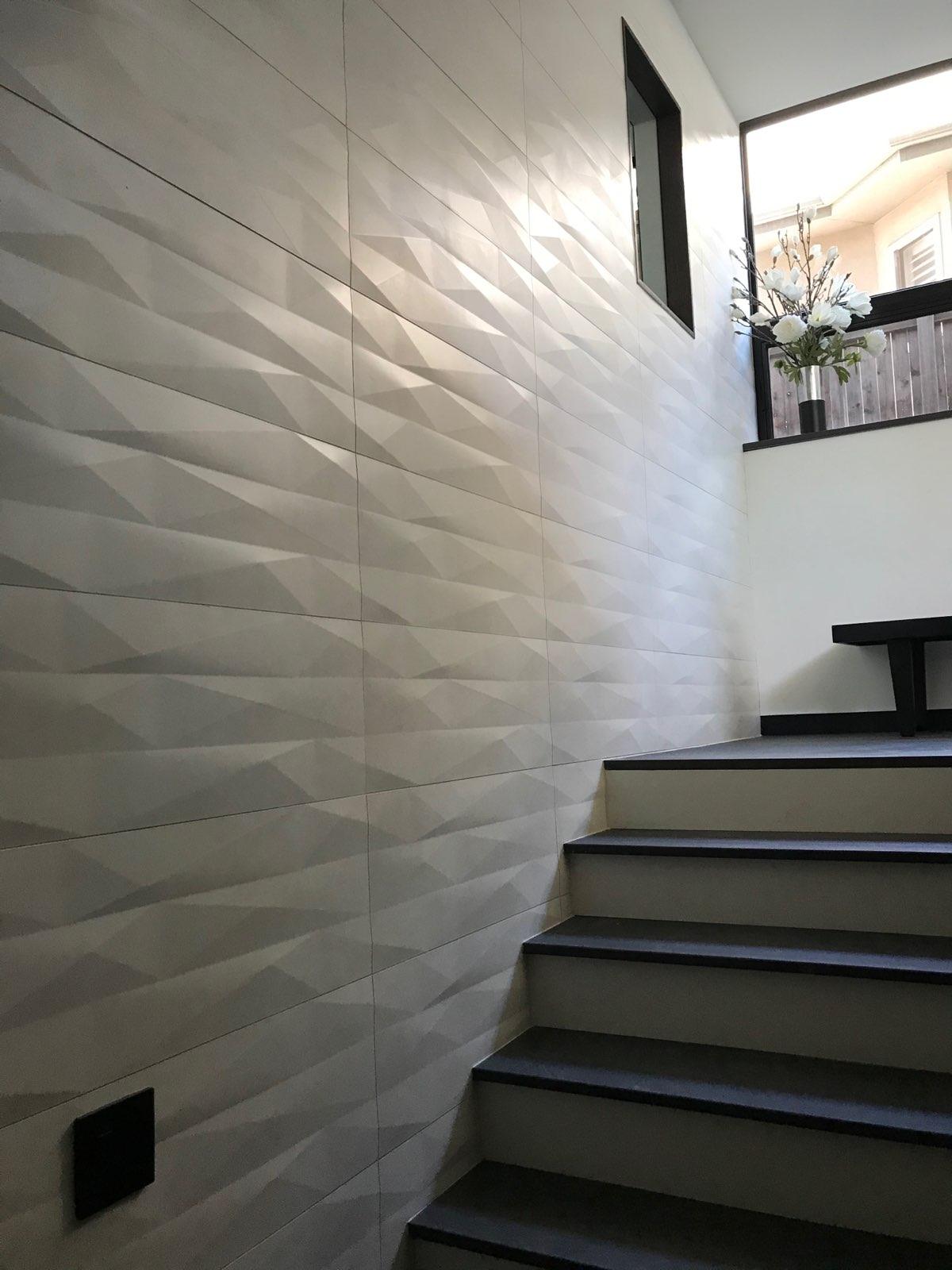 Stairway wall - tiled from basement to the ceiling of second level (28 ...